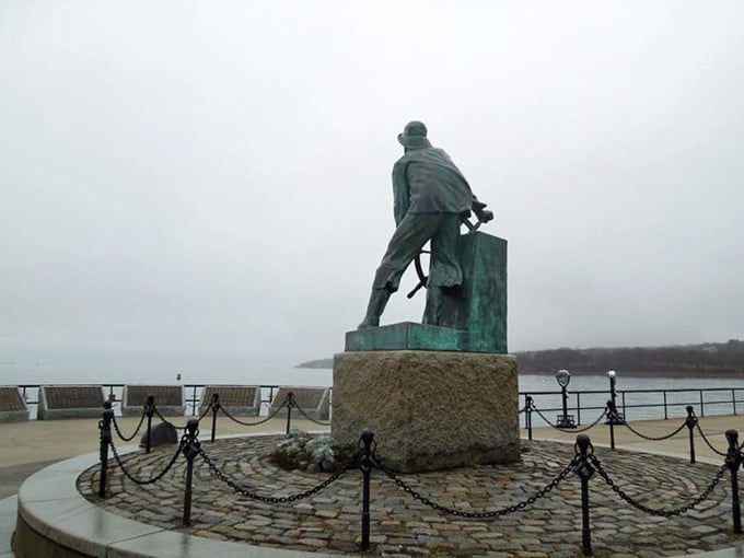 Even on a gray day, the fisherman stands tall. Maybe especially on a gray day. That feels right.