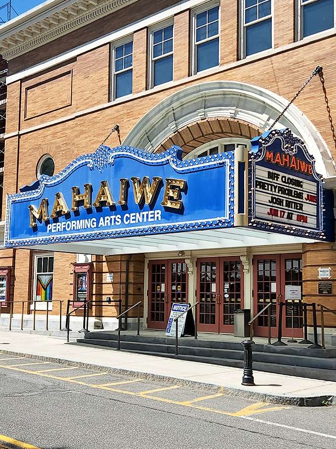 The Mahaiwe Performing Arts Center marquee glows like a beacon reminding you that live entertainment still beats your streaming queue.
