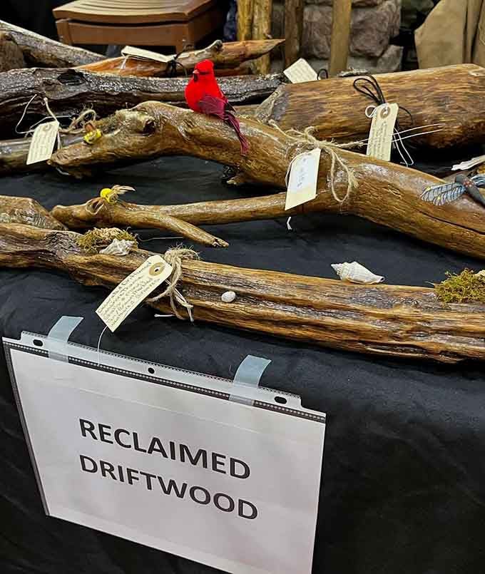 Reclaimed driftwood with tiny cardinals perched on top, because nature makes the best decorators.
