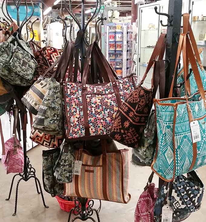 Colorful tote bags hanging like festive flags, the kind that make you rethink your boring grocery store habits.