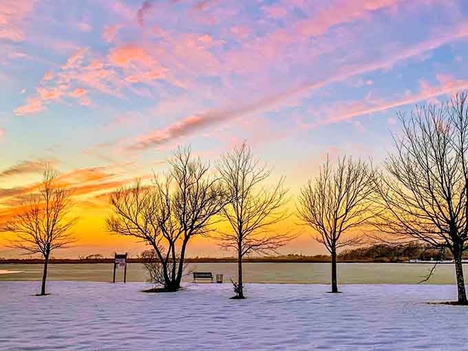 A winter sunset over the snow-covered bay that looks less like Long Island and more like a painting you can't afford.