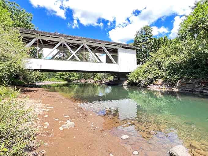 Crystal clear water, smooth river rocks, and a historic covered bridge overhead. Oregon really doesn't hold back.