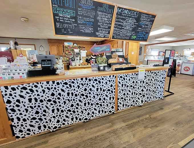 That cow-print counter isn't subtle, and honestly, the confidence it takes to commit that hard to a theme is deeply admirable.
