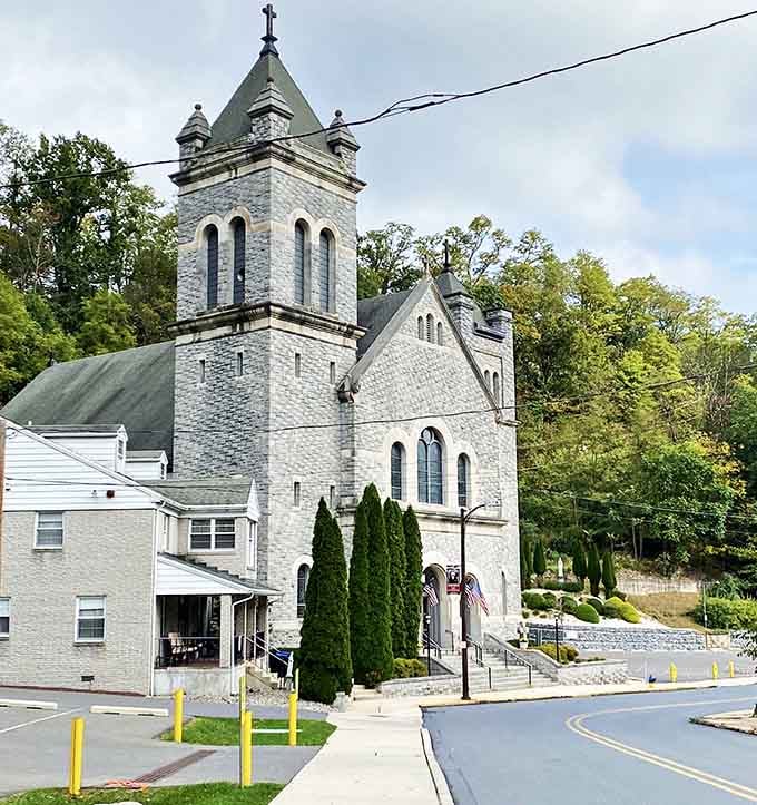 This stone church rising against the forested hillside reminds you that Jim Thorpe builds everything with serious intention.