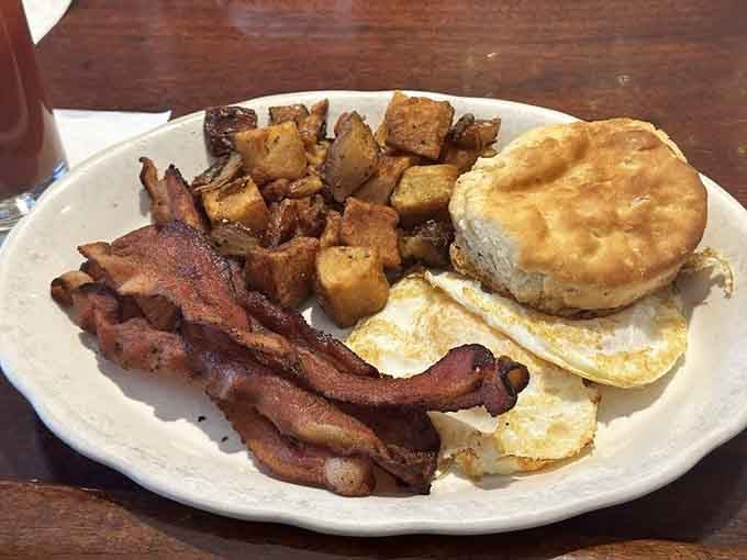 Bacon, eggs, home fries, and a biscuit. Joe's Inn does breakfast like it does everything else, with heart.