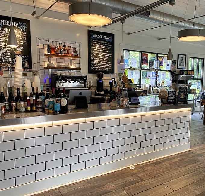 The gleaming espresso machine and subway tile counter create a coffee bar that means serious business about quality drinks.