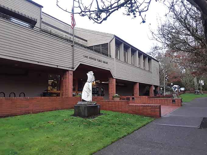The Lake Oswego Public Library sits surrounded by greenery, looking like the kind of place where great ideas feel right at home.