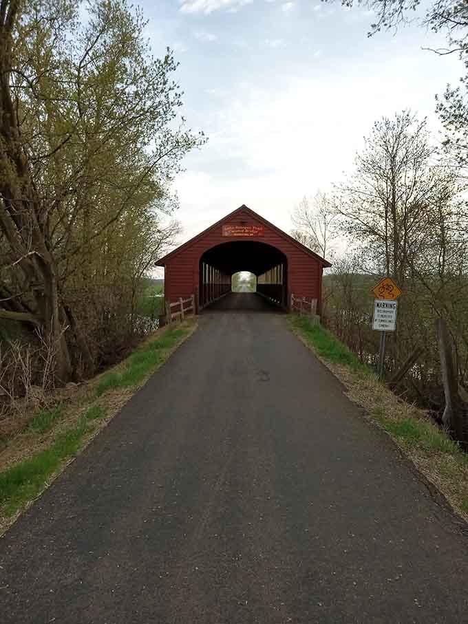 The trail leads straight to that red doorway, and honestly, you'd pick up your pace too.