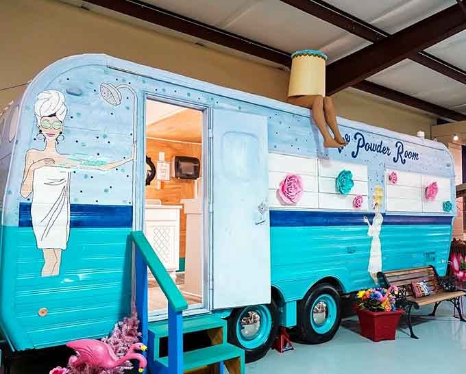 The Powder Room trailer is painted so cheerfully it practically waves hello before you even step inside.