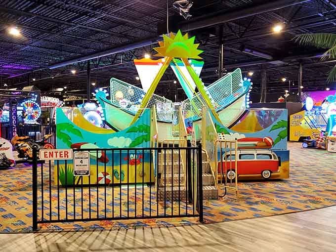 A sunny beach-themed swinging ship ride indoors proves Kentucky doesn't need an ocean to deliver serious summer vibes.