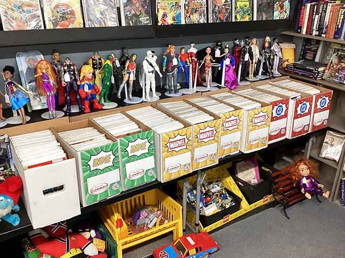Boxes of Marvel and Indie comics alongside action figures, a collector's paradise hiding in plain sight.