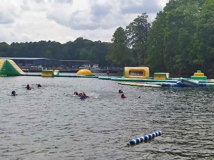An inflatable obstacle course on Lake Lanier, because apparently regular swimming was simply not ambitious enough for this place.