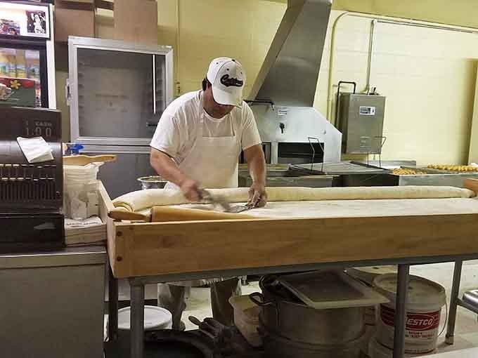 Watching dough being rolled out by hand is like witnessing a craftsman at work, no shortcuts allowed here.