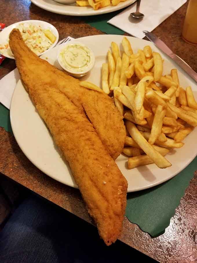 A golden fried fish fillet that practically hangs off the plate. Central New York is clearly not playing around.