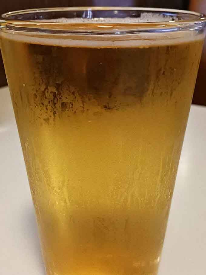 Ice-cold, golden, and beautifully condensed on the outside, this frosty glass is exactly what you want waiting at your table.