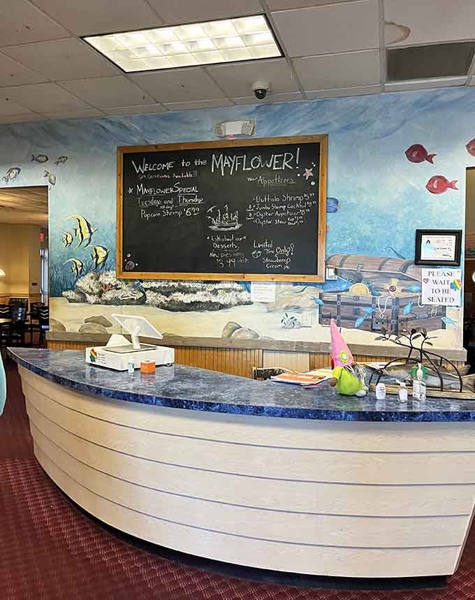 A host stand shaped like a boat bow, surrounded by an underwater mural. Burlington just got a lot more nautical.