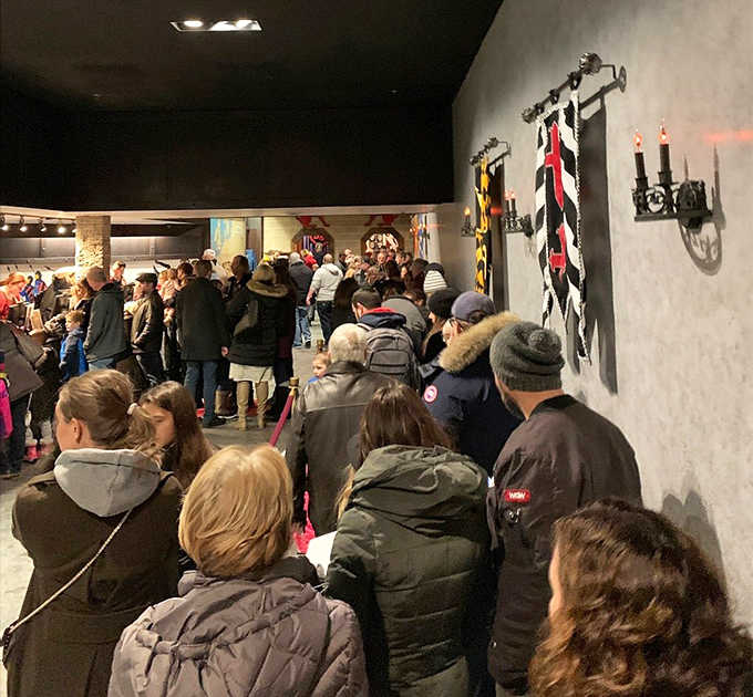 The crowd lines up eagerly, because some experiences are absolutely worth the wait inside castle walls.
