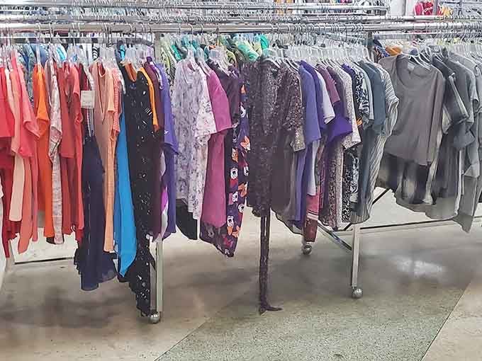 A rainbow of women's tops packed tightly together, like a color wheel that also happens to save you money.