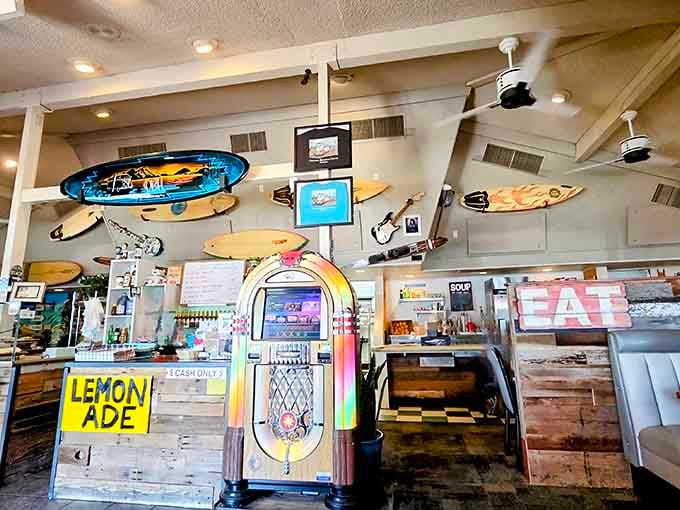 Surfboards on the ceiling and retro vibes everywhere, creating an atmosphere that's equal parts nostalgia and pure fun.