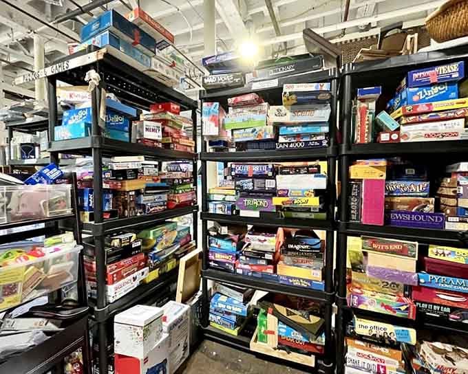 Scrabble, Trivial Pursuit, Pictionary, and dozens more classics stacked high, your next family game night is already waiting on this shelf.
