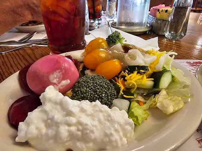 Cottage cheese, pickled beets, cherry tomatoes, and crisp greens sharing one plate like the most colorful neighborhood potluck you've ever attended.
