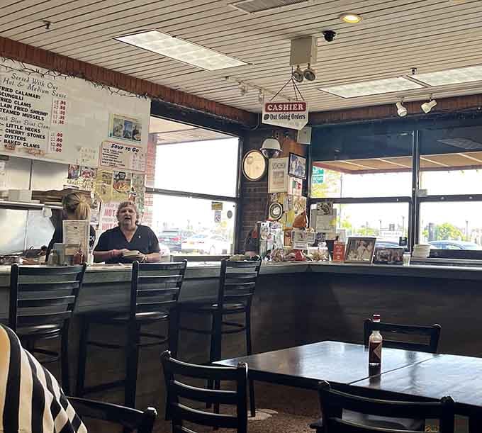 Behind that counter, orders get called out and food gets made, the kind of no-nonsense energy that keeps regulars coming back.