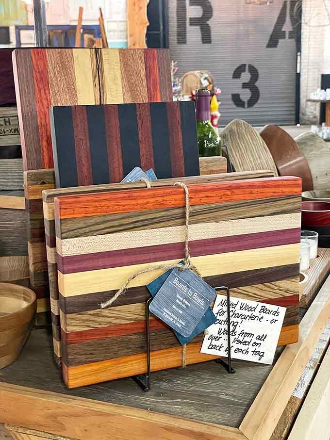 Mixed wood cutting boards striped in rich, warm tones, the kind of craftsmanship that makes your kitchen counter look like a gallery wall.