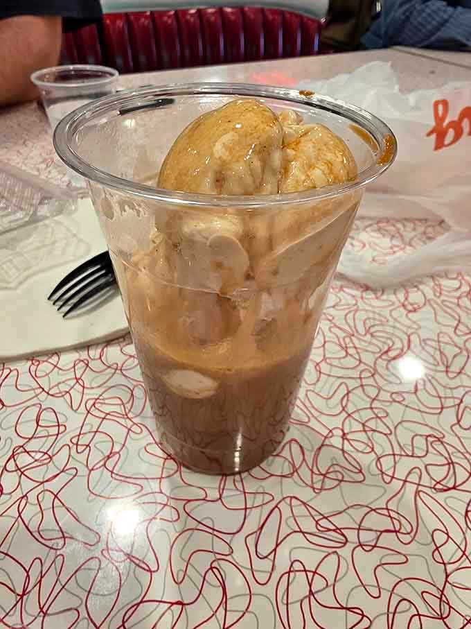 An ice cream float that looks like it was poured with the confidence of someone who knows exactly what they're doing.