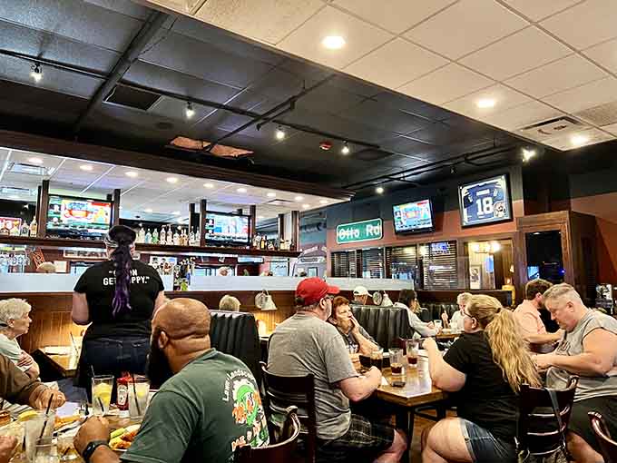 A full house of happy diners, TVs glowing, and good food everywhere. This is what a neighborhood tavern looks like.