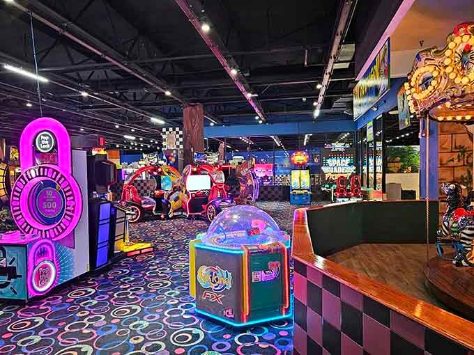 Rows of glowing arcade games stretching into the distance, like a candy store designed specifically for your inner ten-year-old.