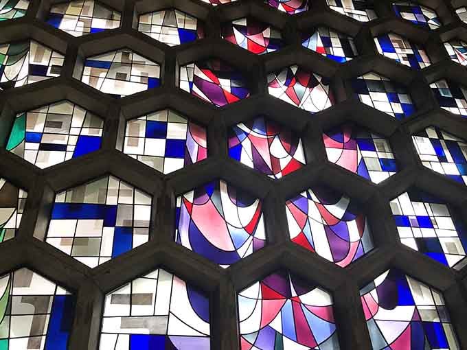 Those honeycomb windows aren't just pretty, they're basically a light show that changes every hour like nature's own Instagram filter.