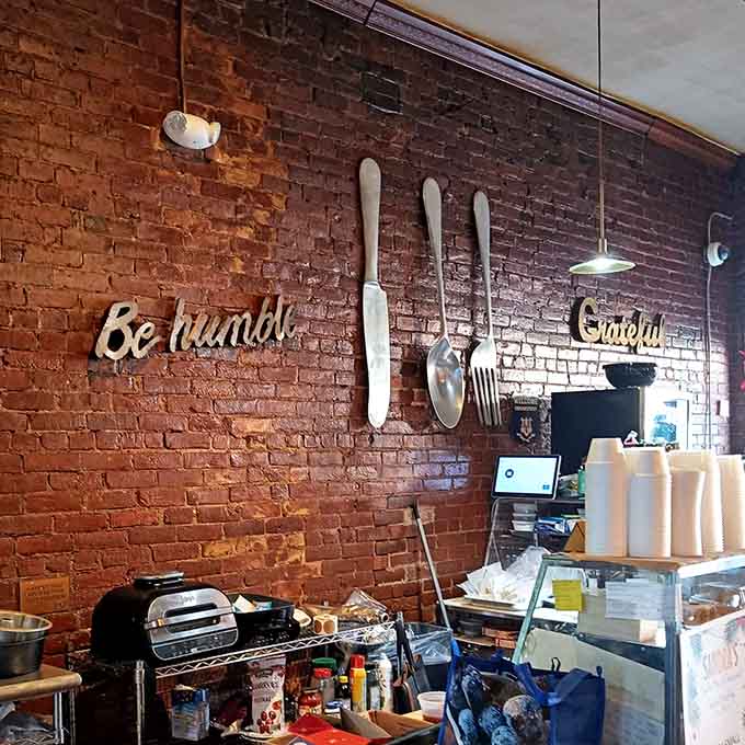 Exposed brick walls adorned with oversized utensils remind you that eating here is serious business done joyfully.