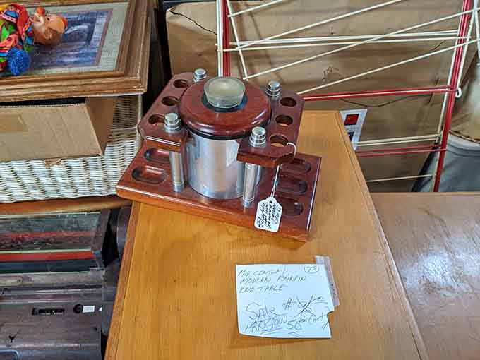 A vintage pipe rack that once organized someone's contemplative smoking collection with impressive wooden craftsmanship and style.
