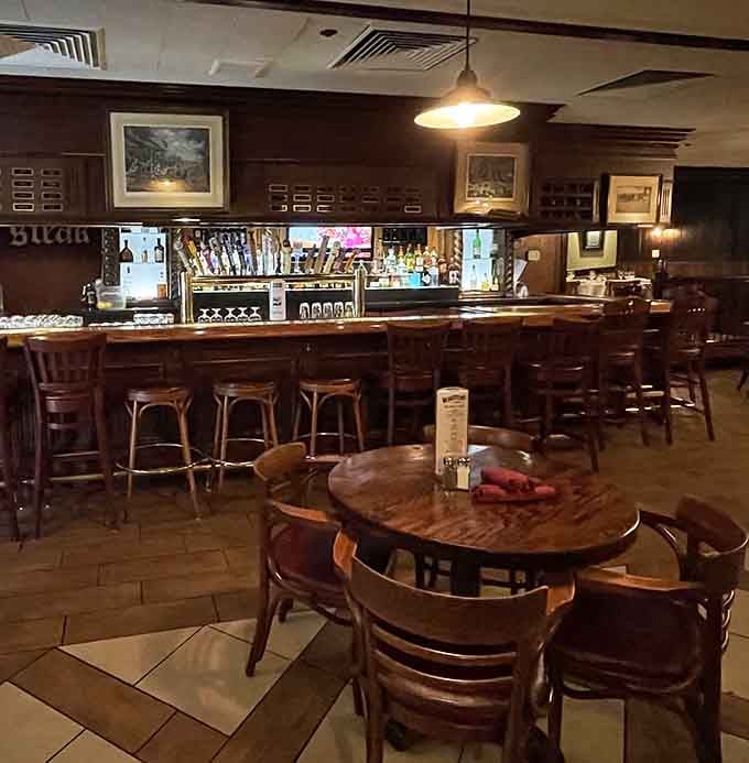 The Winston's Pub bar area is warm, woody, and exactly where you want to end up after a long week.