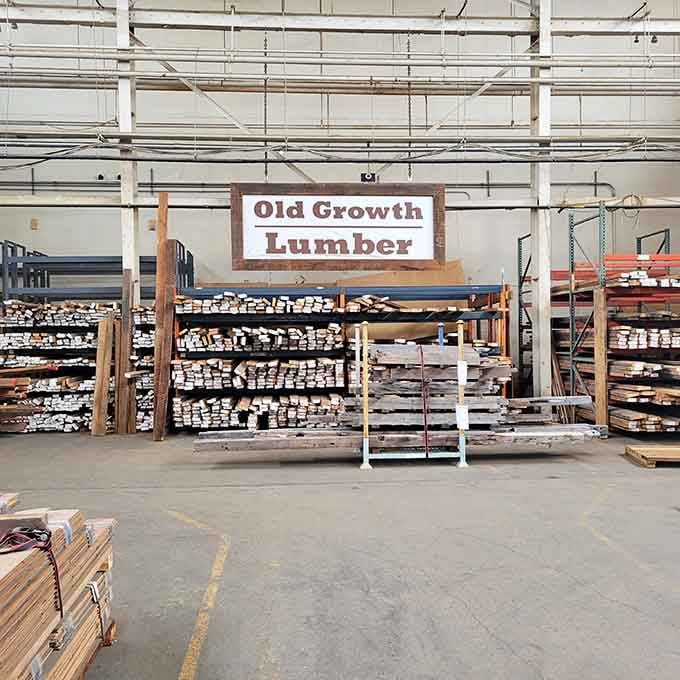 Old growth lumber stacked floor to ceiling, because some wood is simply too good and too honest to throw away.