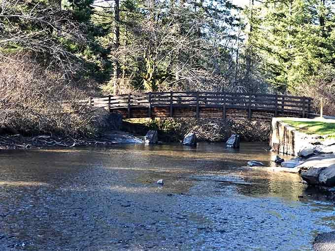 This little wooden bridge has welcomed more muddy boots than a Pacific Northwest doormat on a rainy Sunday morning.