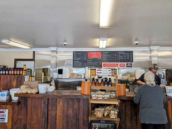 The order counter at Skylight Inn BBQ is where the magic officially begins &mdash; step up and commit.