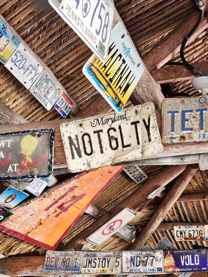 Look up at Stan's ceiling and you'll find license plates from Maryland to Michigan. Someone here has been collecting stories for decades.