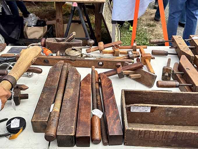A table full of wooden hand tools that were built to last, and clearly, they meant it.