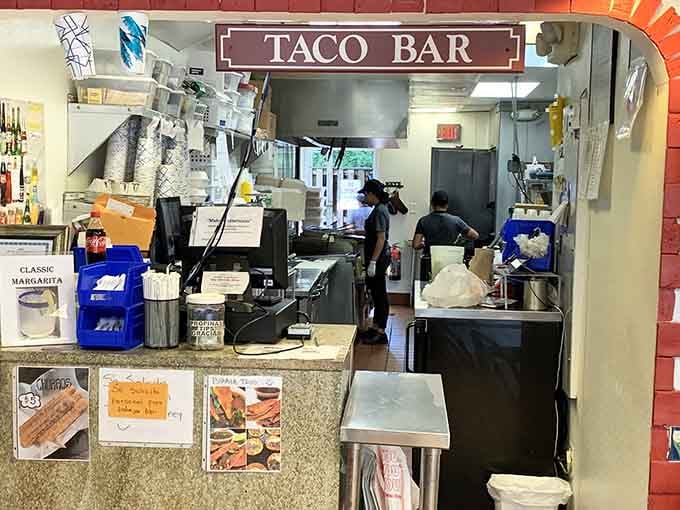The order counter where magic begins, connecting hungry customers with the kitchen's delicious creations behind those walls.