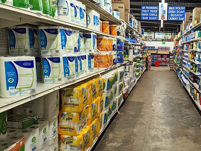 Paper towels, dish soap, bleach, and Bounty stacked high. Beach house living demands supplies, and The Big Store delivers every time.