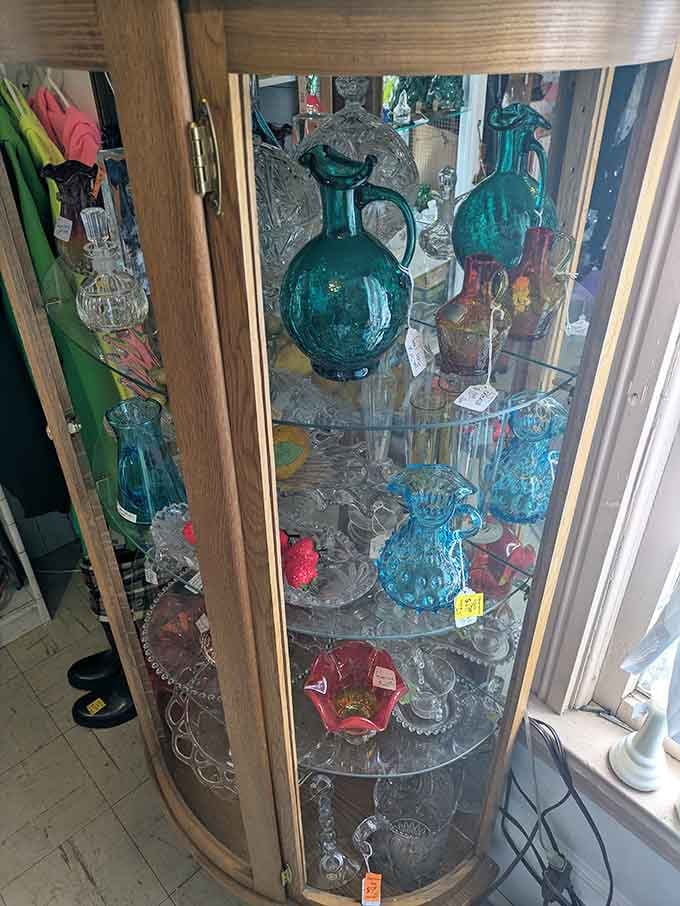 Colored glass in teal, ruby, and amber catching the light like a stained-glass window you can actually own.