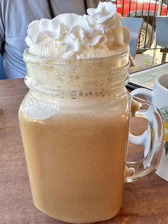 That mason jar of iced coffee topped with whipped cream is basically dessert disguised as morning fuel.