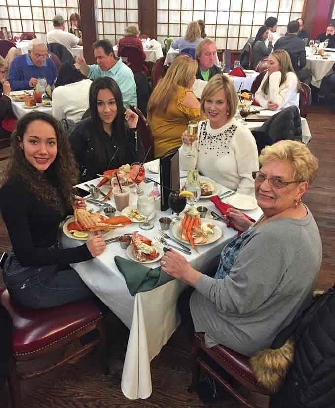 Four generations, a pile of lobster, and big smiles. This is exactly what Sunday dinner is supposed to look like.