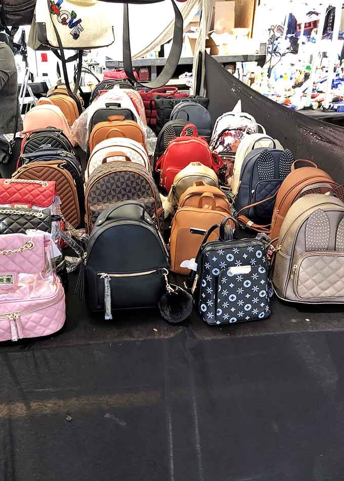 Backpack bonanza stacked like colorful building blocks, ready to carry your life's essentials without emptying your wallet.