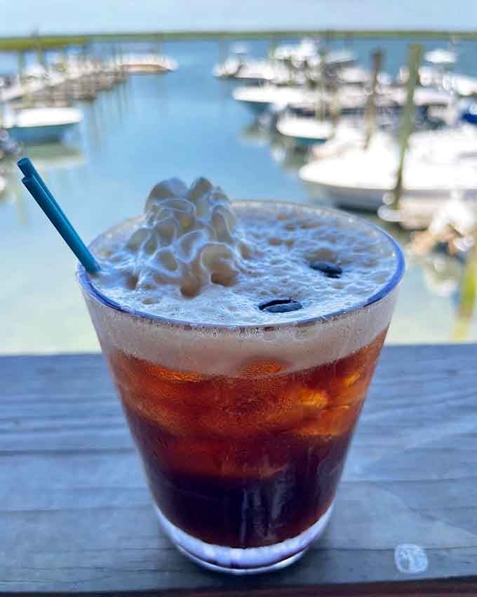 A creamy, frothy wake-up cocktail with a marina full of boats behind it. Mornings at the Shore have never looked this good.