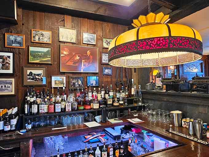 The bar area glows with vintage charm, where that distinctive lampshade adds character you can't buy at HomeGoods.