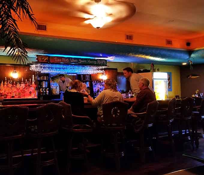 The bar sign says "Time Flies When You're Having Rum," and honestly, nobody here is arguing with that.