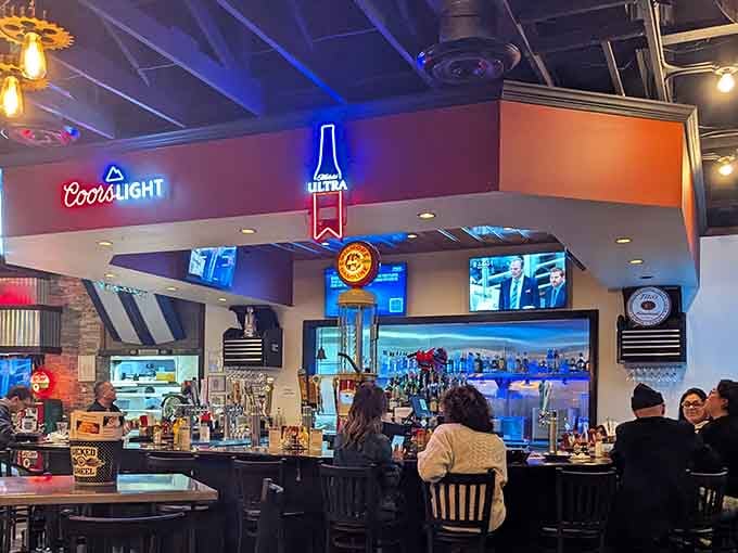 Neon signs, draft taps, and flat screens overhead, the bar area at The Wicked Wheel is exactly where you want to be.
