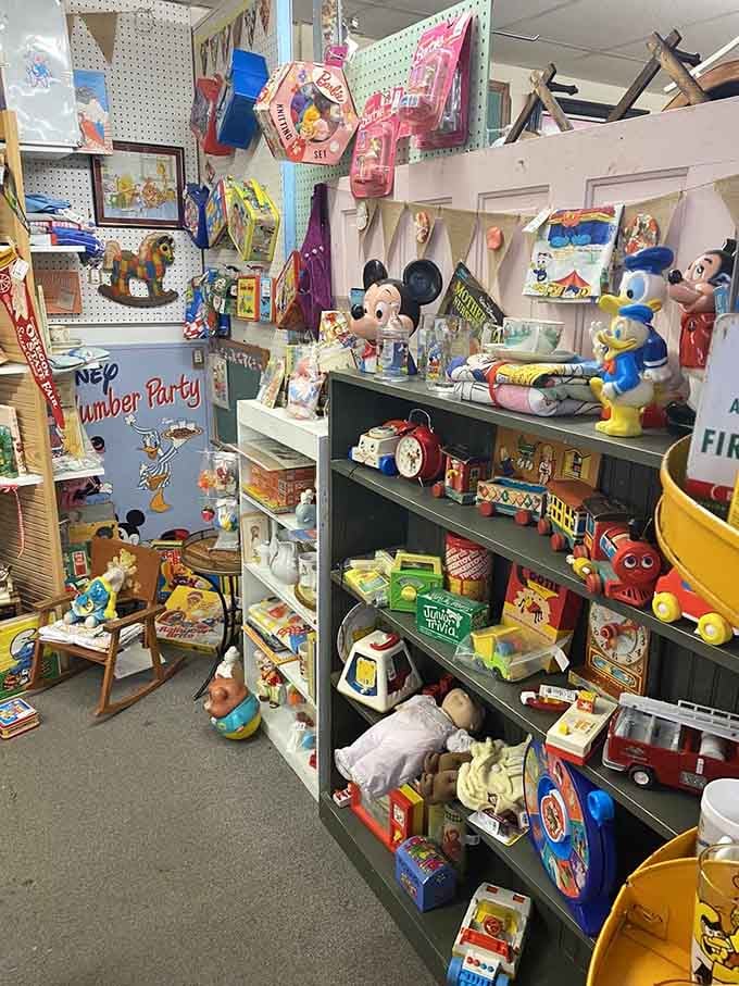 Mickey Mouse and friends keeping watch over a toy collection that spans multiple generations of childhood.
